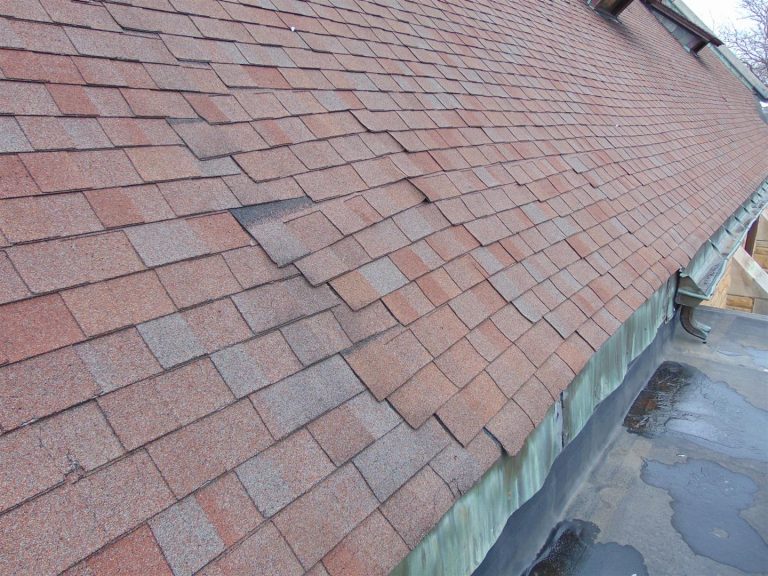 Improper shingle nailing - Structure Tech Home Inspections