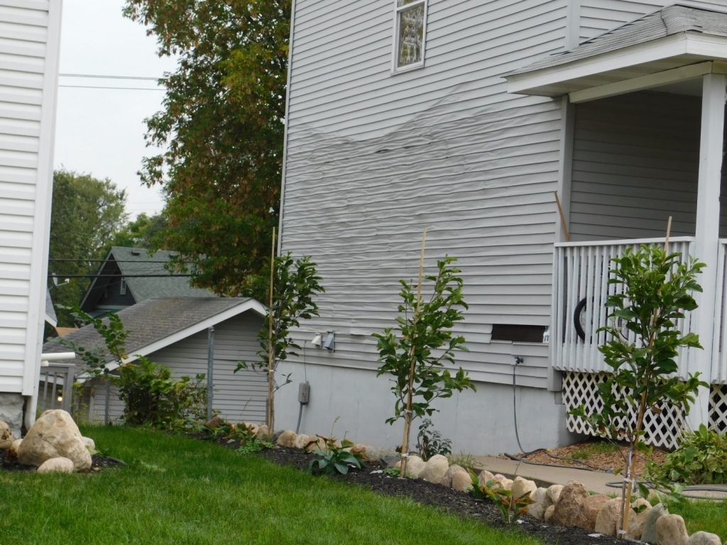 Melted Vinyl Siding - Structure Tech Home Inspections